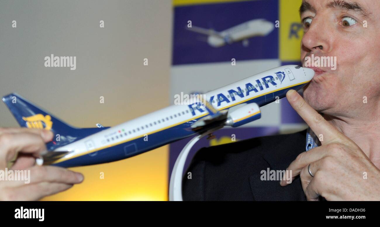 Ryanair CEO Michael O'Leary poses with a Ryanair model plane at the ...