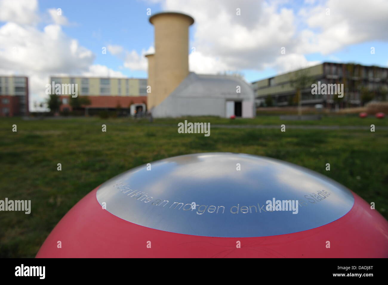 A red elliptical object that is a part of the sound installation AIR ...