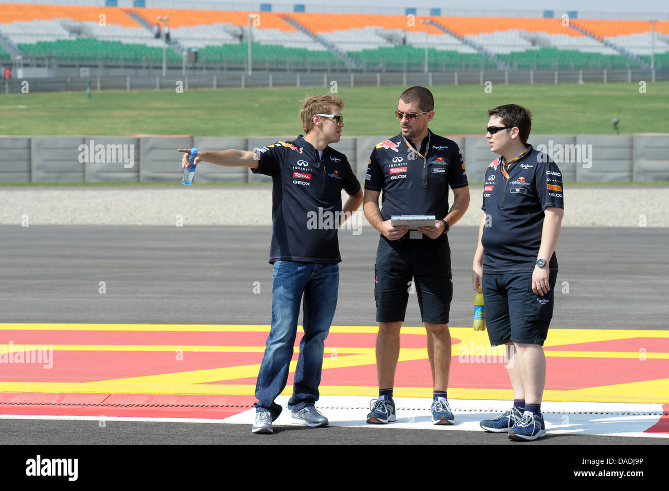 German Formula One driver Sebastian Vettel (L-R) of Red Bull, his race ...