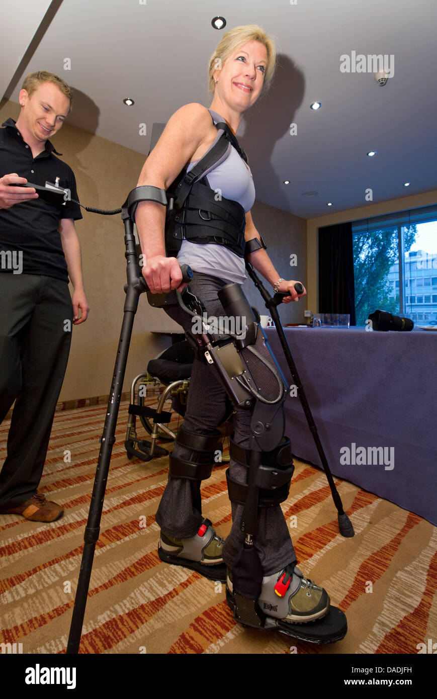 American paraplegic "test pilot" Amanda Boxtel walks with the wearable ...