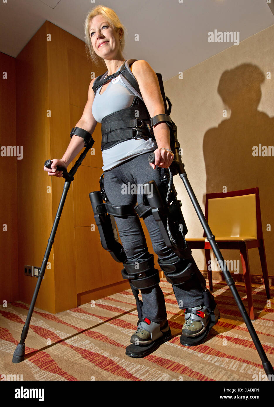 American paraplegic "test pilot" Amanda Boxtel walks with the wearable ...
