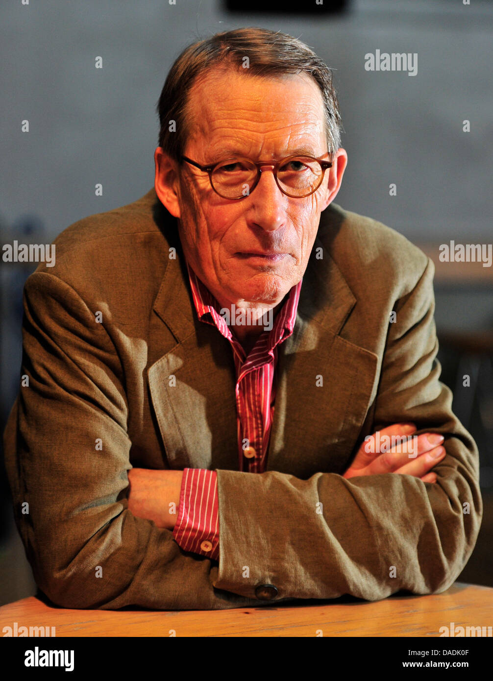 Writer Friedrich Christian Delius sits at a table prior to a reading in ...