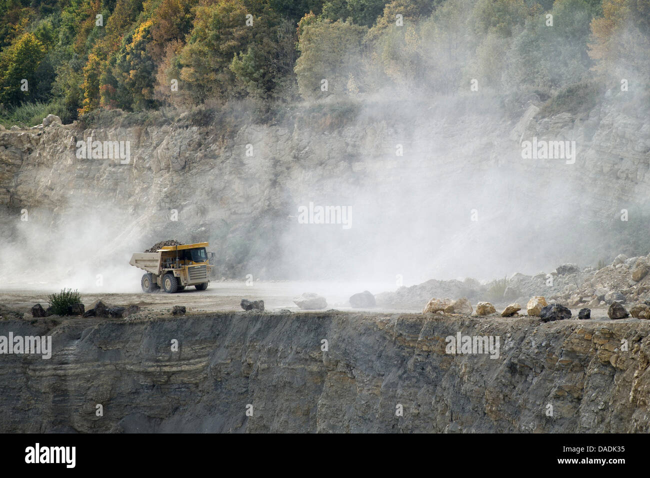 Exploited limestone is transported with a dump lorrey at the limestone ...