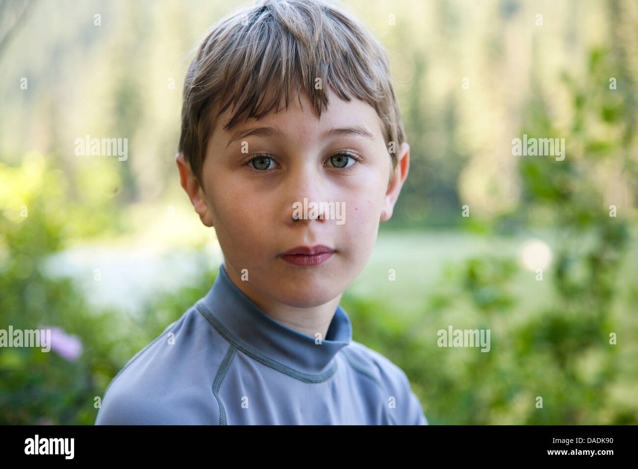 Boy looking at camera Stock Photo - Alamy