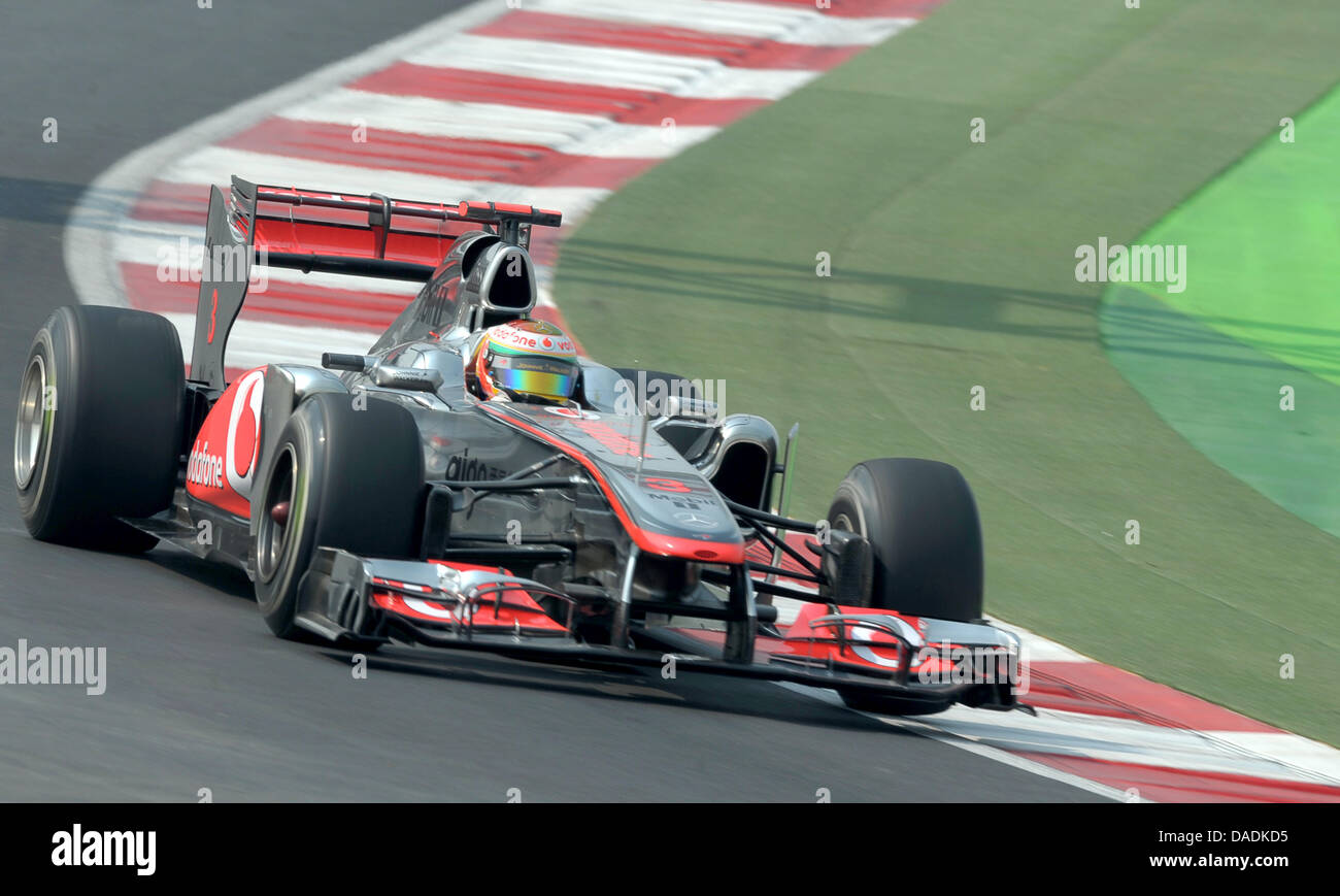 British Formula One driver Lewis Hamilton of McLaren Mercedes steers ...