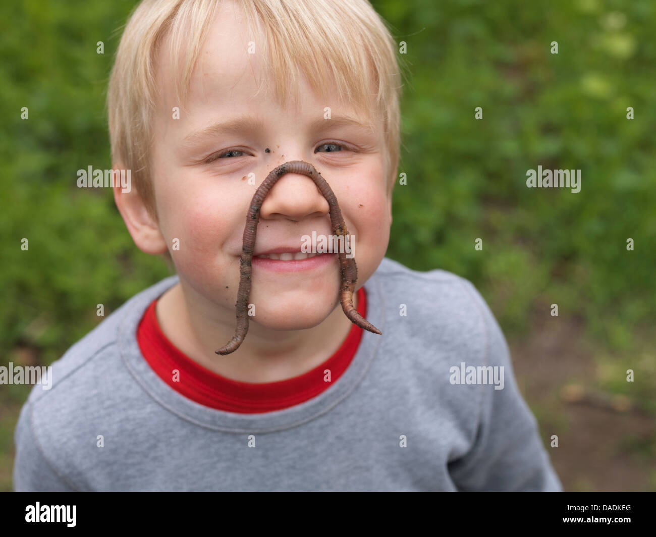Boys wearing worm on face hi-res stock photography and images - Alamy