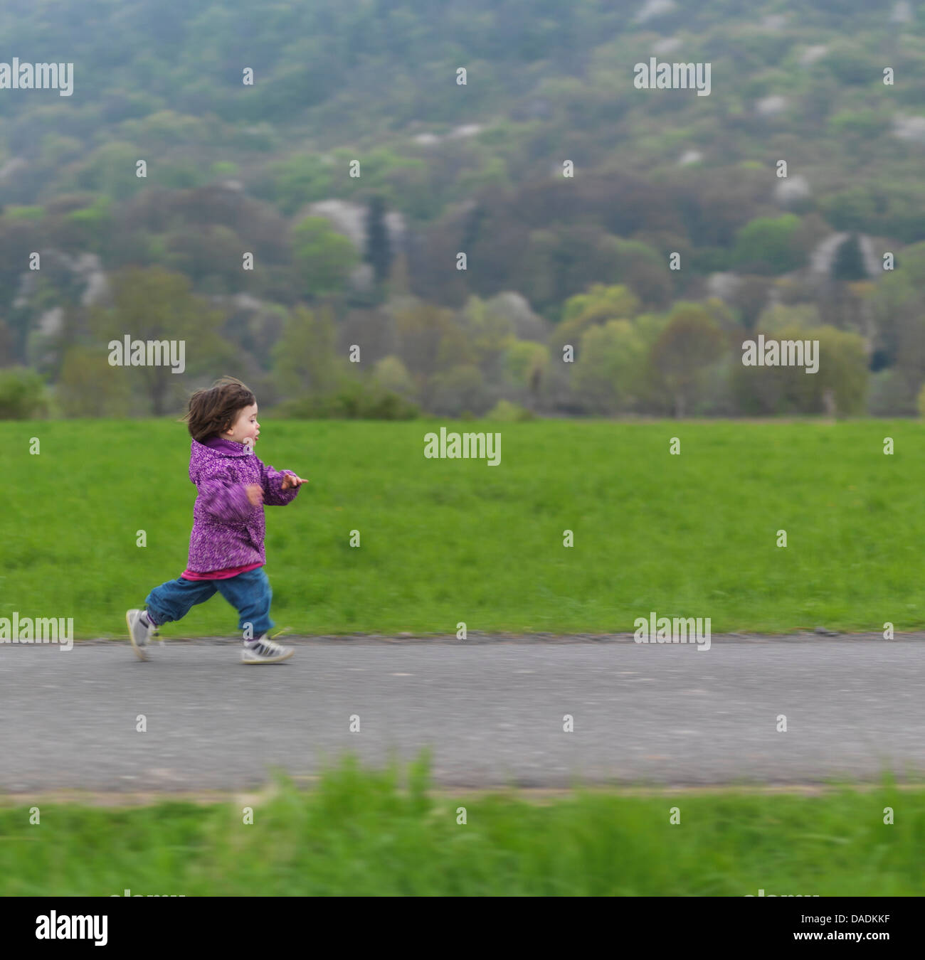 Girl running on footpath hi-res stock photography and images - Alamy