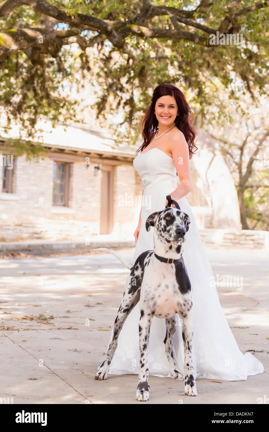 USA, Texas, Potrait of young bride with dog, smiling Stock Photo - Alamy
