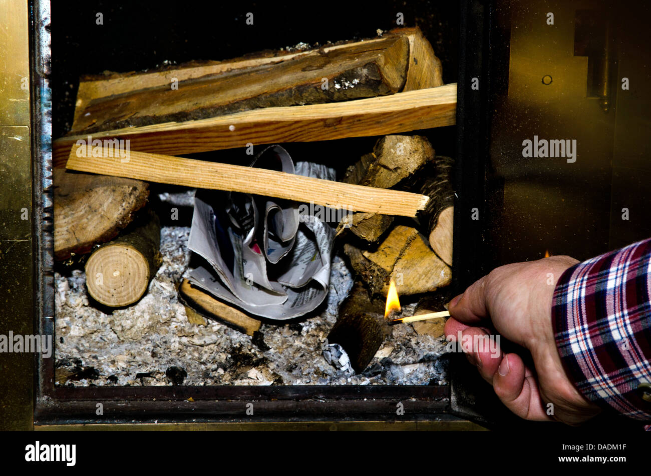 Lighting the fire Stock Photo - Alamy
