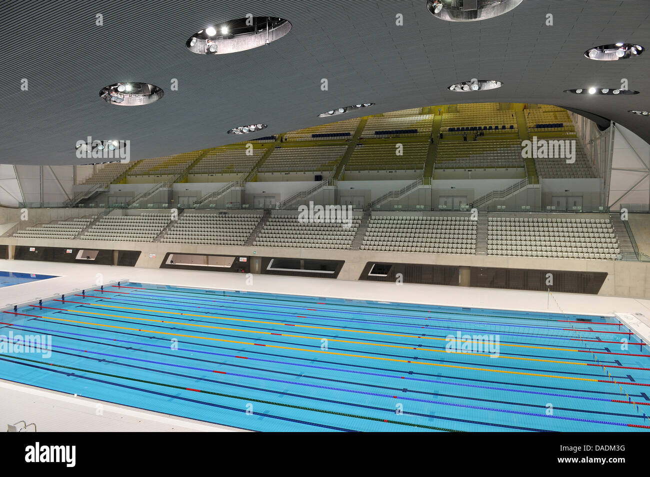 The swimming stadium (Aquatics Centre) designed by architect Zaha Hadid ...