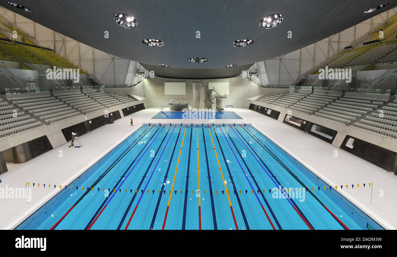 The swimming stadium (Aquatics Centre) designed by architect Zaha Hadid ...