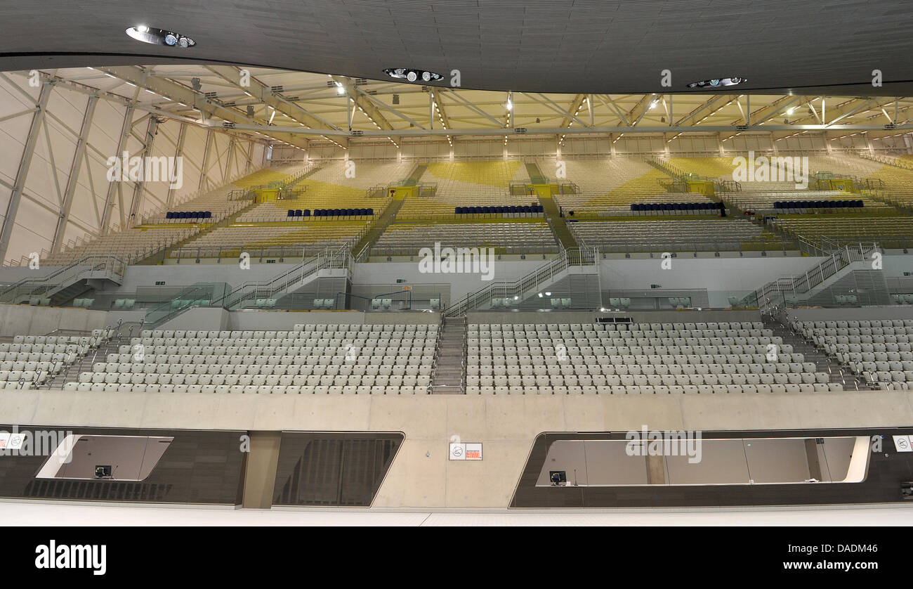 The tribunes of the swimming stadium (Aquatics Centre) designed by ...