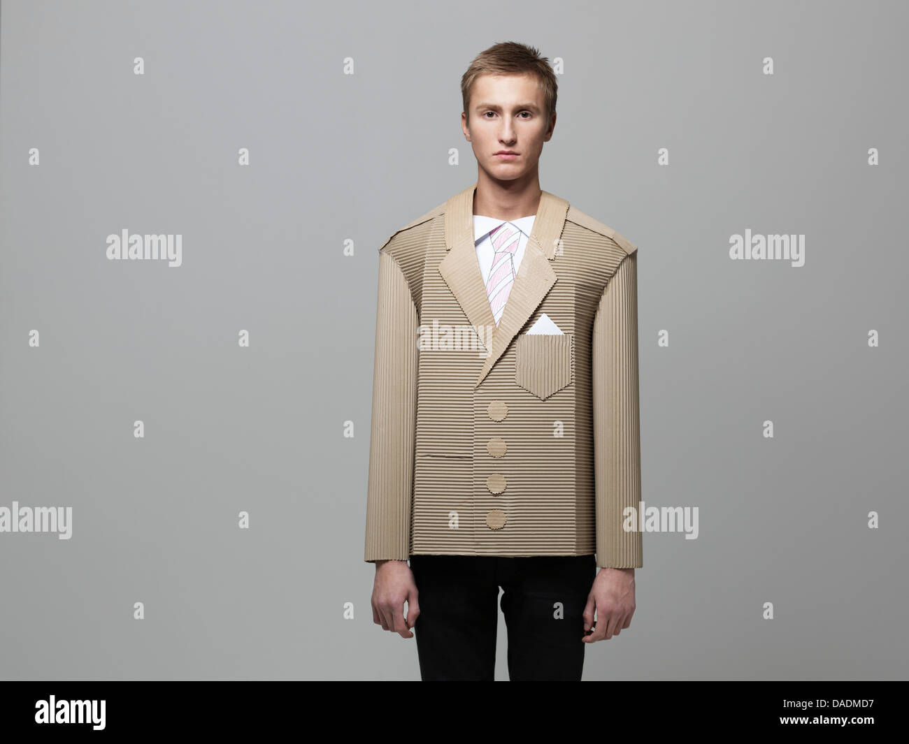 Man wearing jacket made out of corrugated cardboard Stock Photo - Alamy