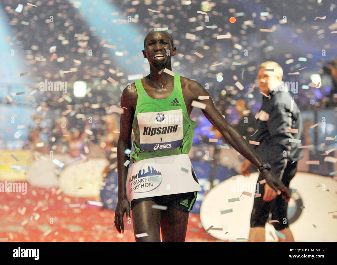 Kenyan runner Wilson Kipsang crosses the finish line of the Frankfurt Marathon at Festhalle in ...