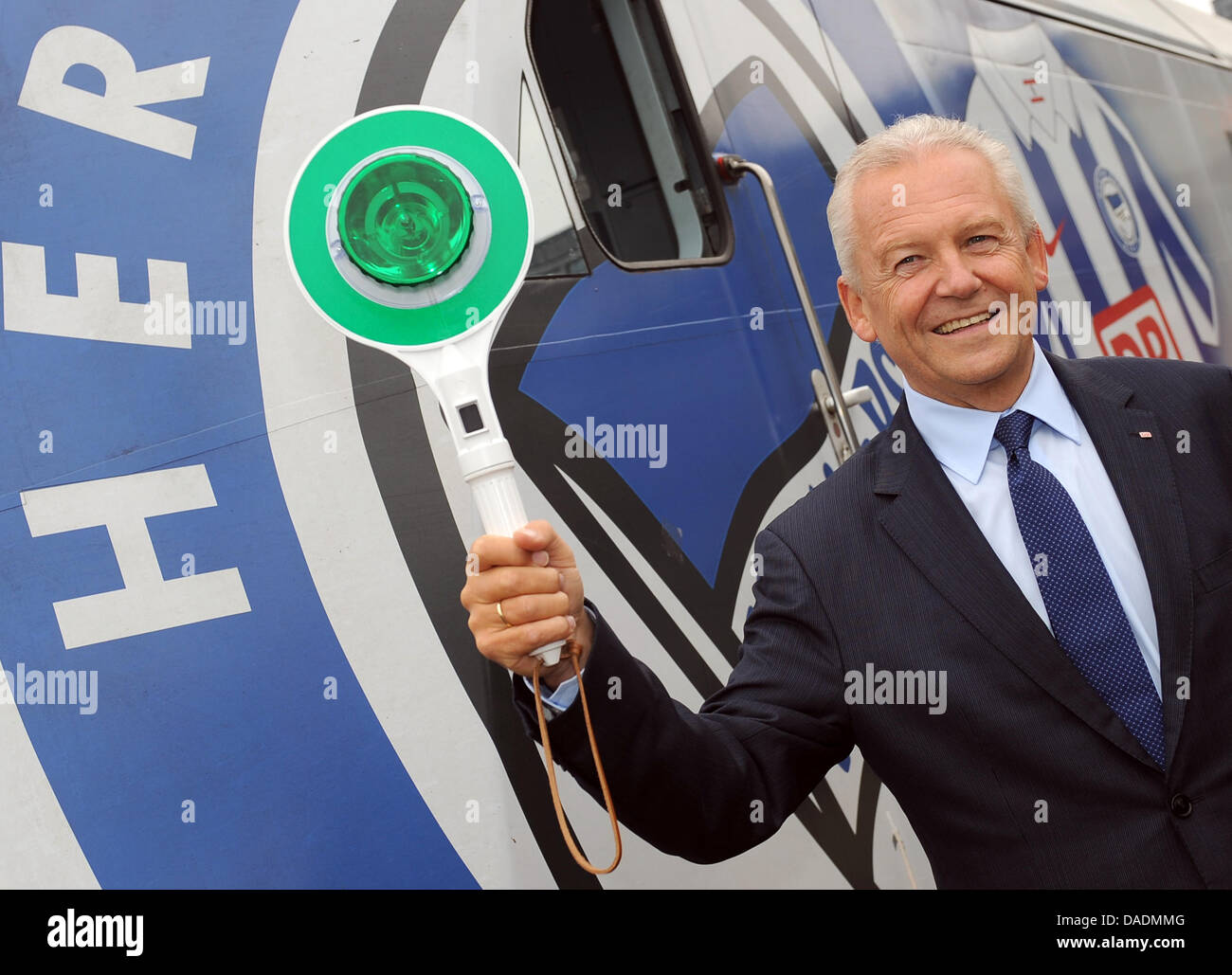 Deutsche Bahn CEO Ruediger Grube poses in front of the Hertha BSC fan ...