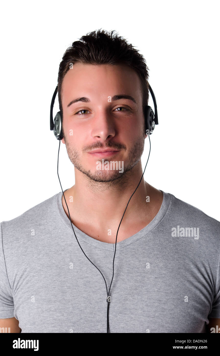 Handsome young man listening hi-res stock photography and images - Alamy