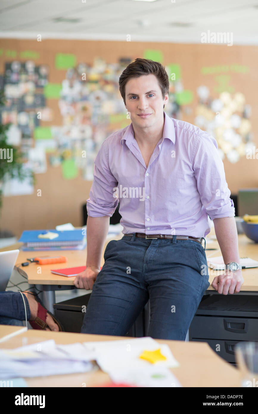 Man in front of office desk hi-res stock photography and images - Alamy