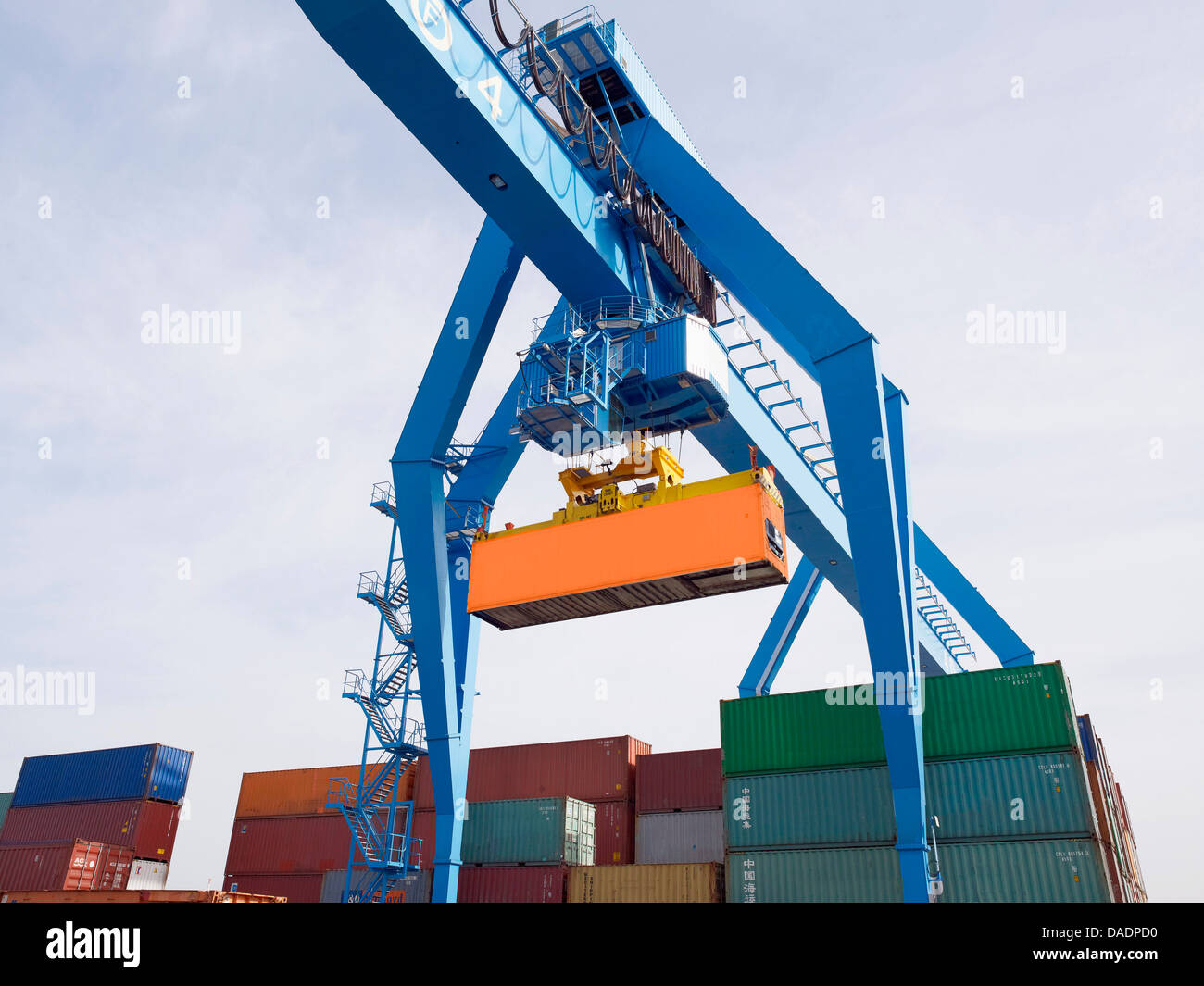 Germany, Mainz, Cargo container hanging on a crane Stock Photo - Alamy