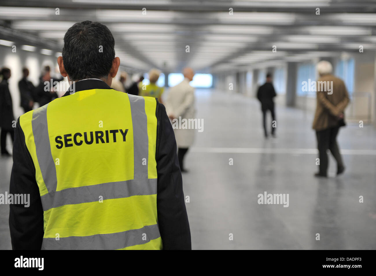 Security guards watch the Main Press Centre in London, Great Britain ...