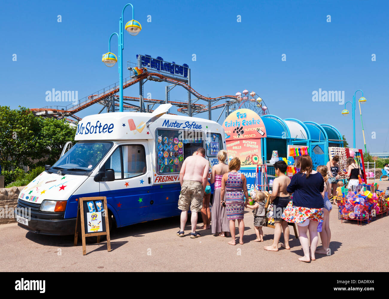 People queueing for an ice cream from an ice cream van parked on ...