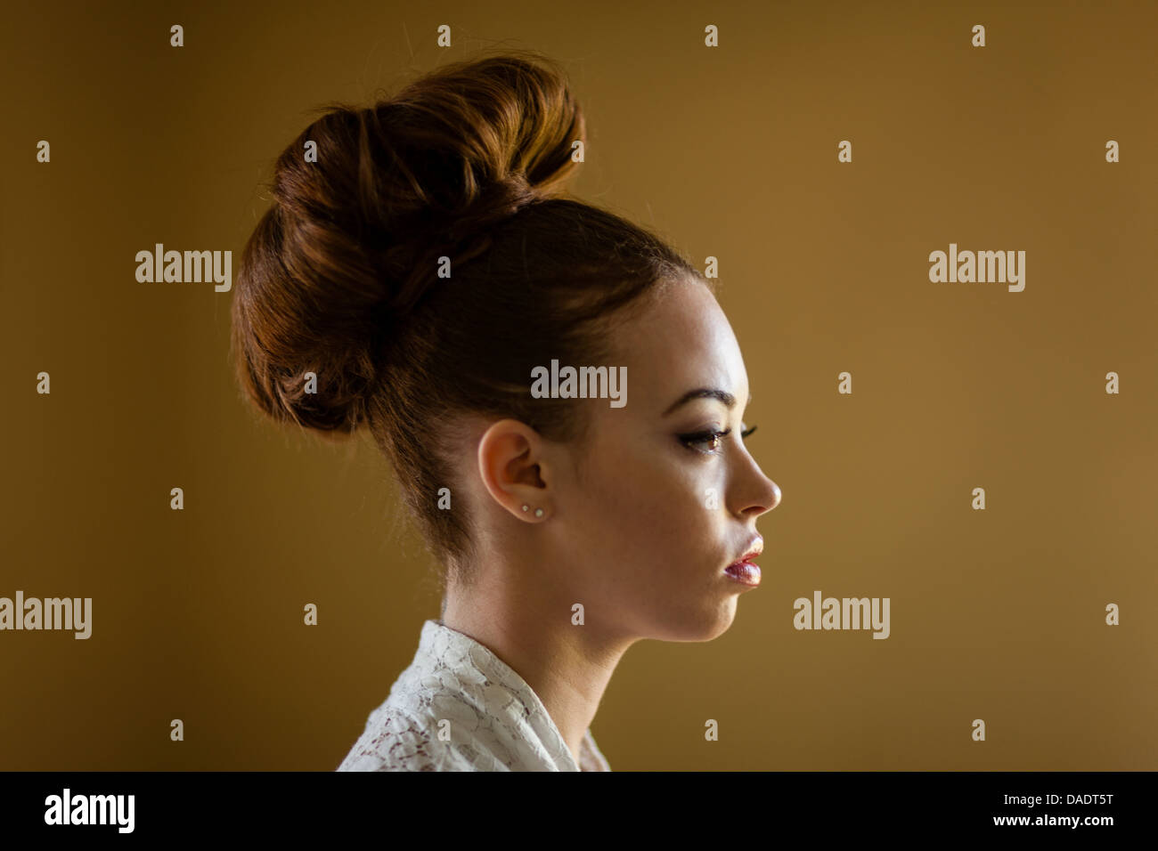 One woman side hair bun hi-res stock photography and images - Alamy