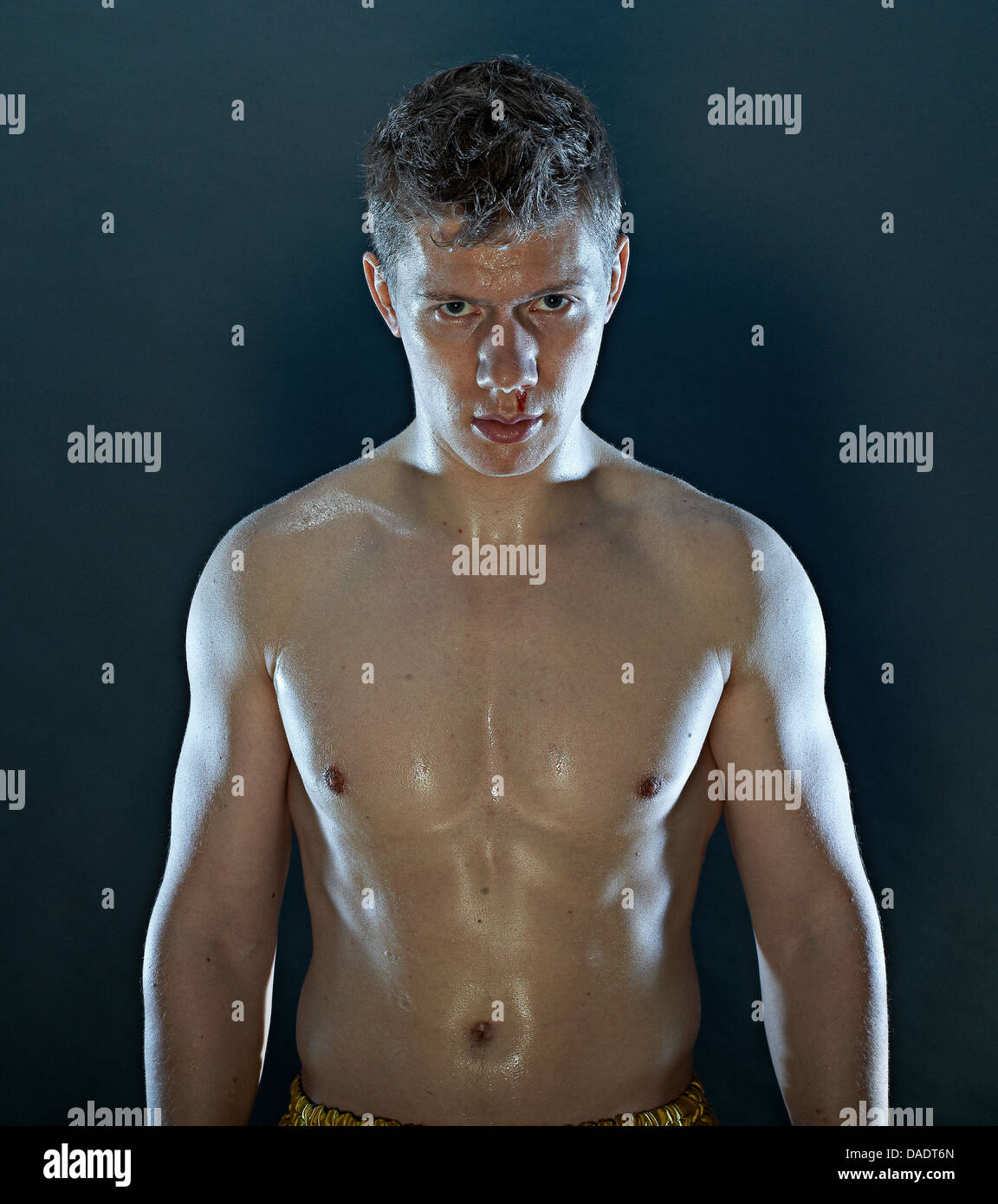Portrait of young male boxer with bloody nose Stock Photo - Alamy