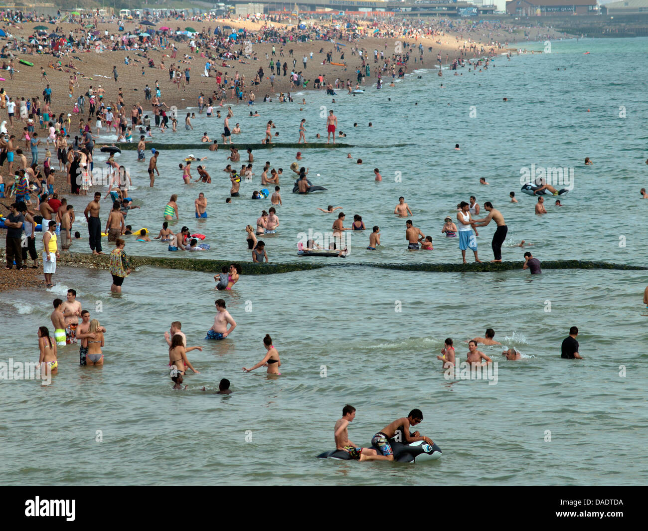 A crowded Brighton beach on a summer's day Stock Photo - Alamy