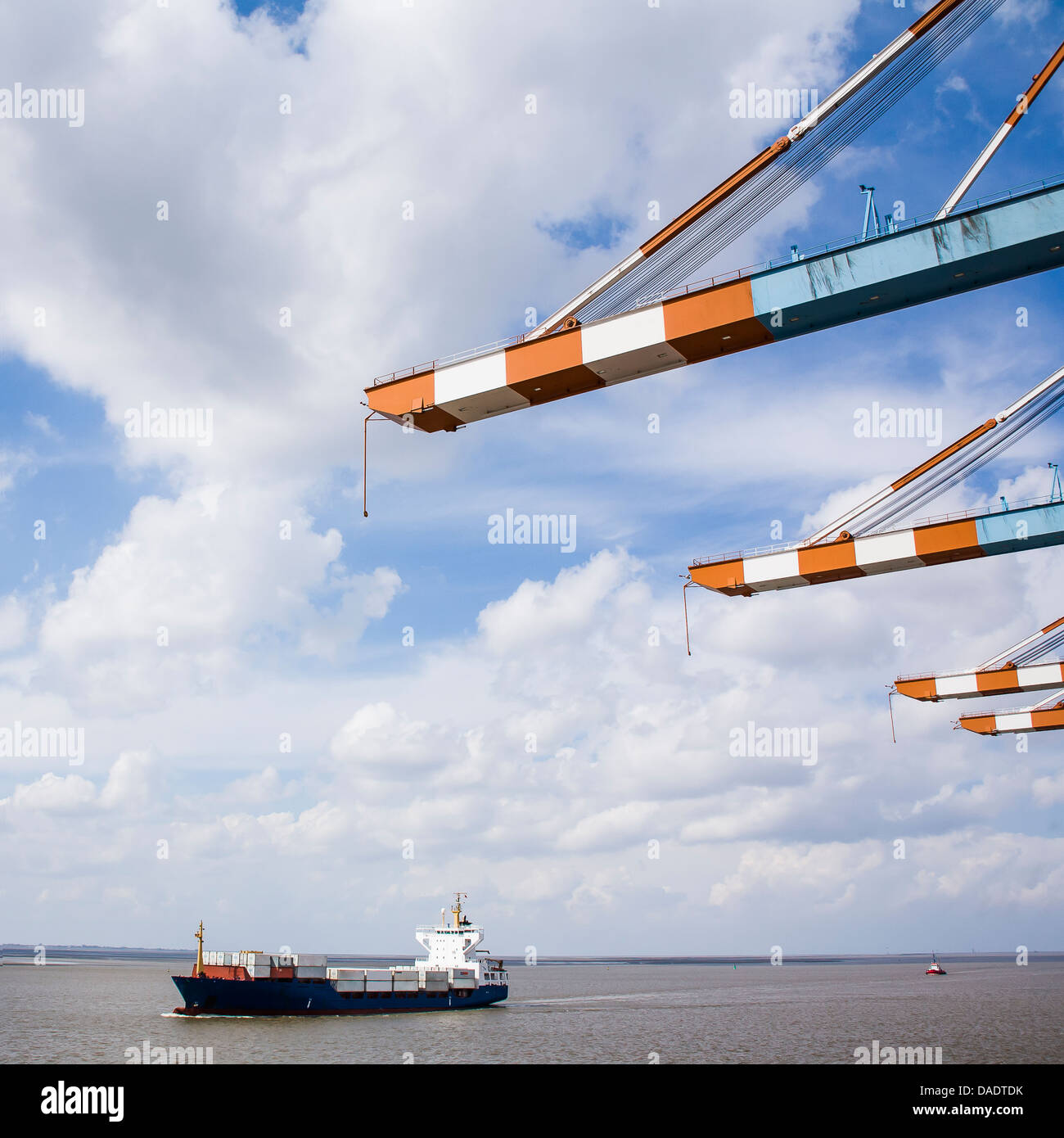 Germany, Bremerhaven, Container ship passing pier Stock Photo - Alamy