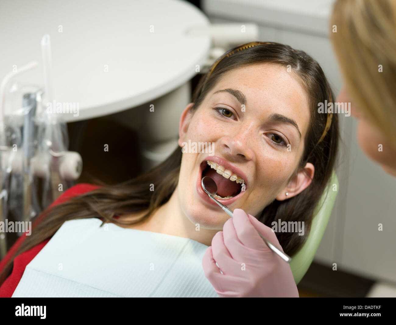 Examining womans teeth dentists hi-res stock photography and images - Alamy