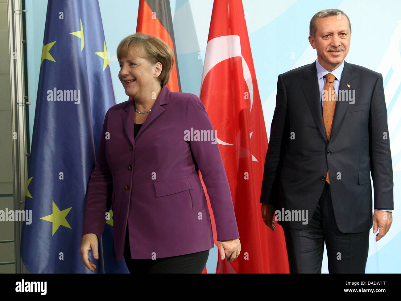German Chancellor Angela Merkel (CDU, L) stands next to Turkish Premier ...