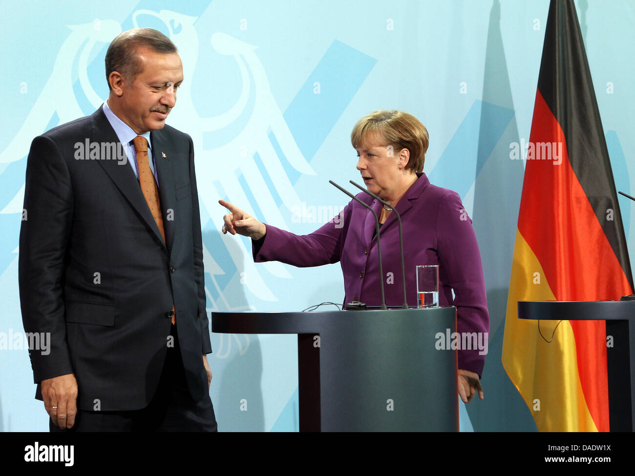 German Chancellor Angela Merkel and Turkish Premier Recep Tayyip ...