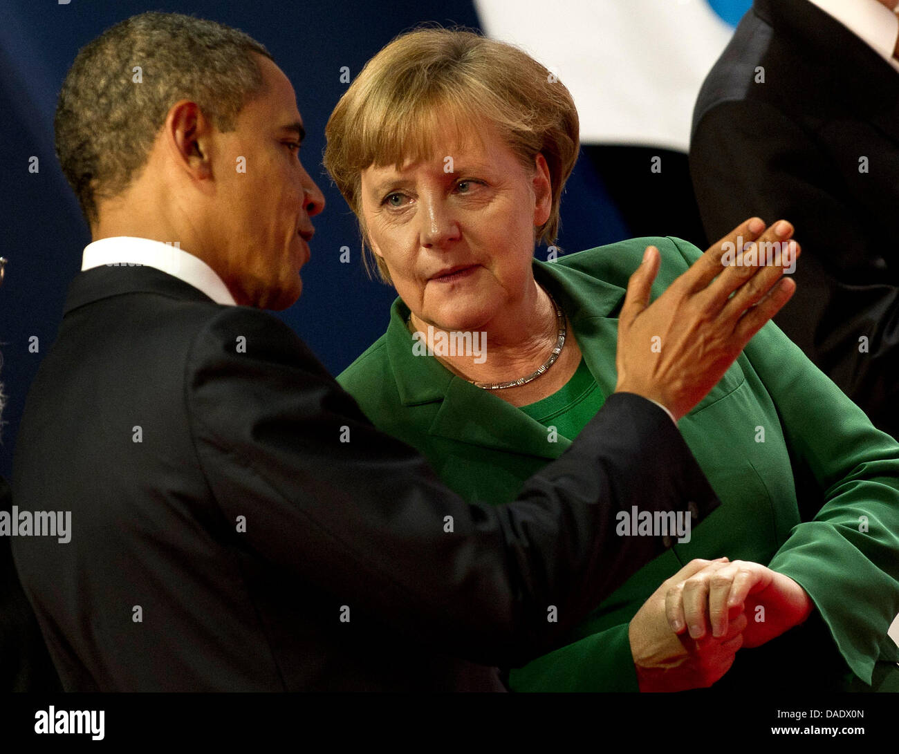 German Chancellor Angela Merkel (R) and US President Barack Obama talk ...