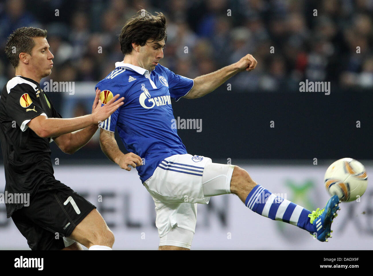 Schalke's Jan Moravek (r) and Larnaca's Edwin Linssen (l) fight for the ...