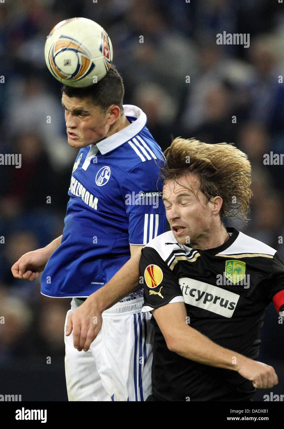 Schalke's Kyriakos Papadopoulos (l) and Larnaca's Gregor van Dijk (r ...