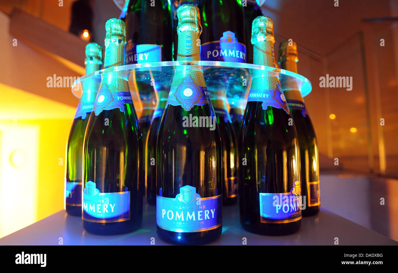 Bottles of Pommery champagne are offered to guests at the 175th ...