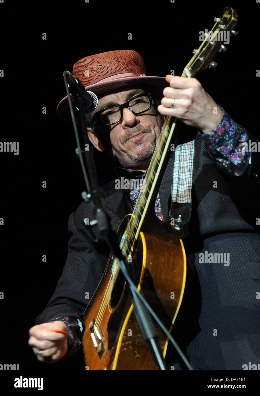 The British musician Elvis Costello performs on stage at the Tempodrom ...