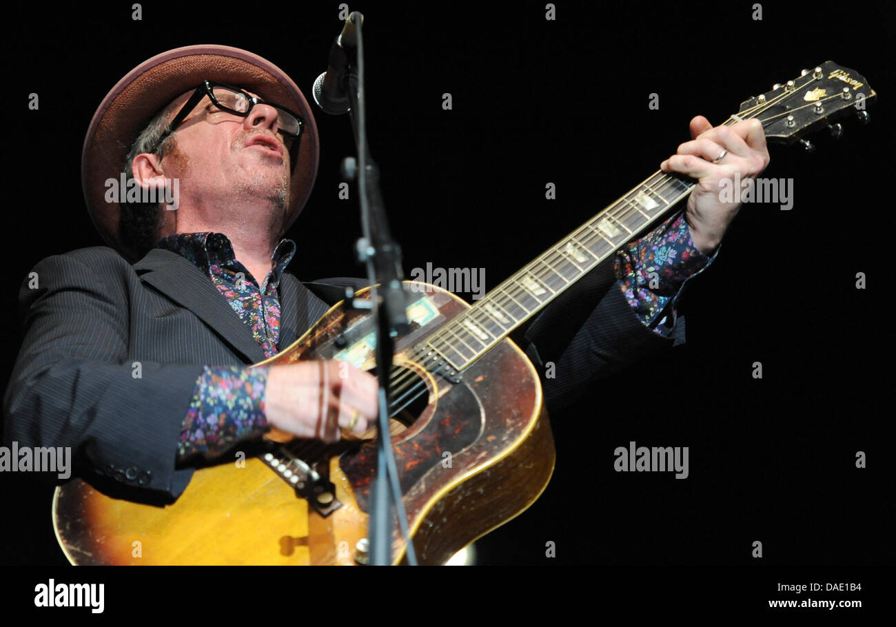 The British musician Elvis Costello performs on stage at the Tempodrom ...