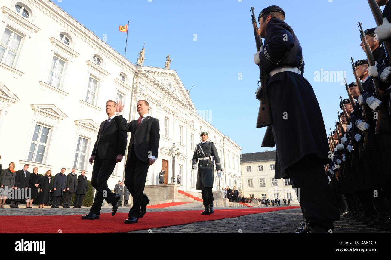 The Russian President Dmitry Medvedev (M) is welcomed with military ...