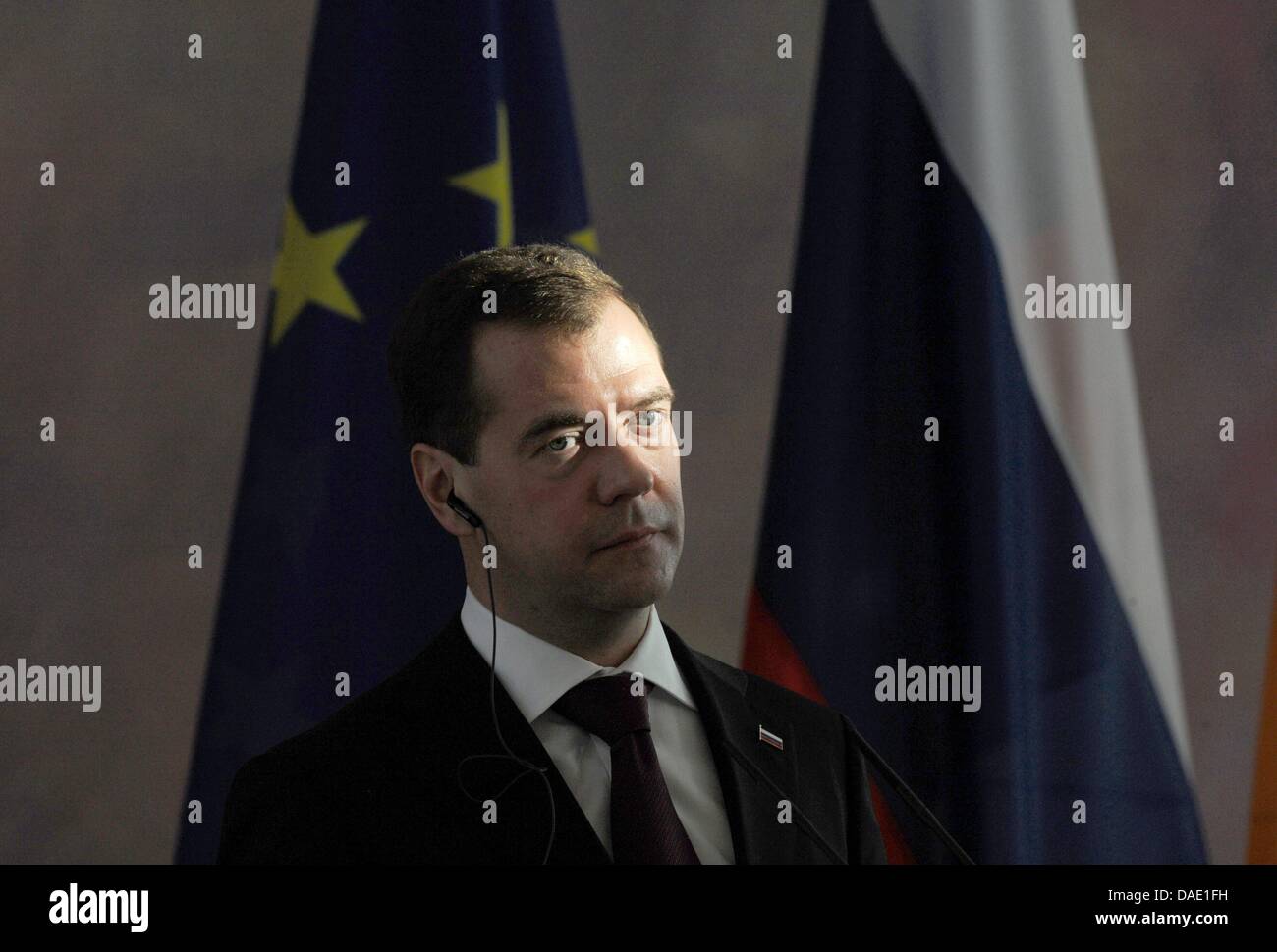Sunlight touches the face of the Russian President Dmitry Medvedev ...