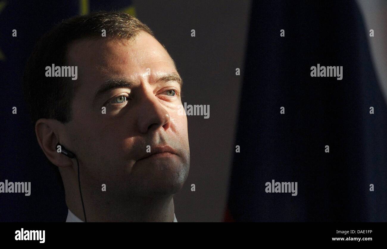 Sunlight touches the face of the Russian President Dmitry Medvedev ...