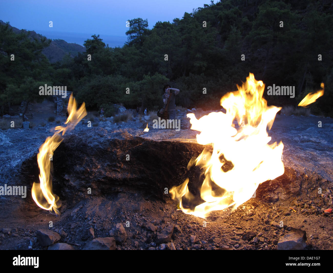 The flames of eternal fires lick from the rocks at the Olympos national ...