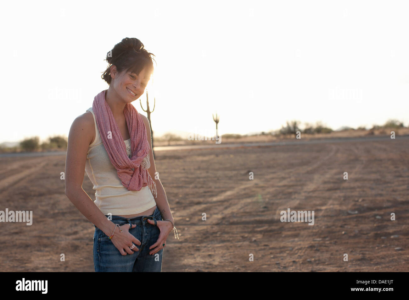 Young woman standing in desert hi-res stock photography and images - Alamy