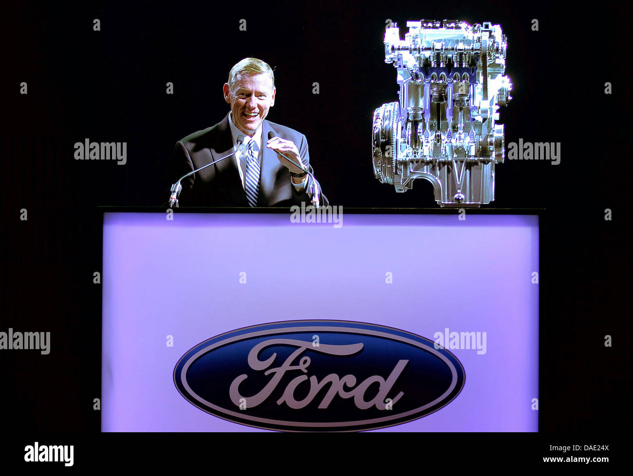 Alan Mulally, CEO of Ford, presents the 1.0 liter engine EcoBoost in ...
