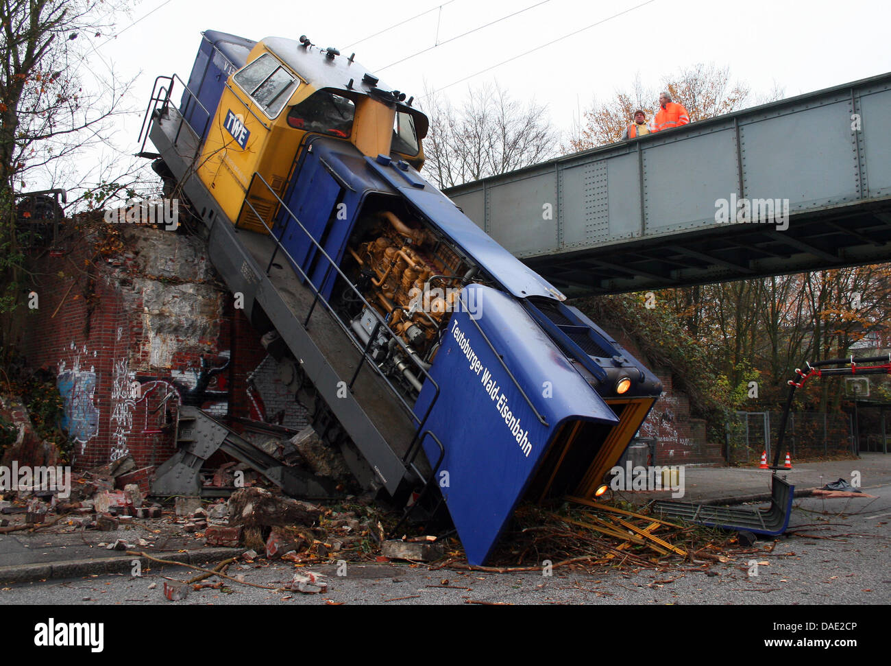 A diesel locomotive lies on a street in Hamburg, Germany, 10 November ...