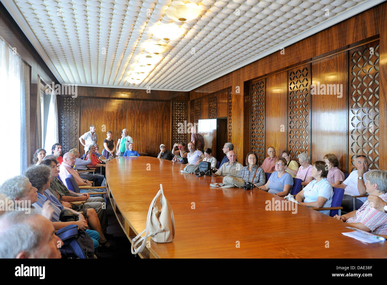 Visitors sit in the conference hall of the former GDR radio station at ...