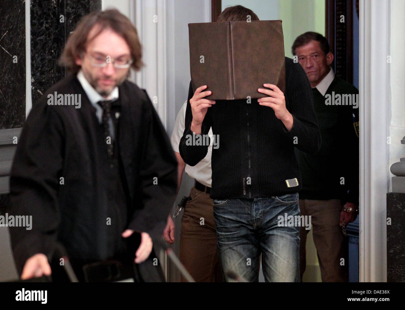 The 27-year-old defendant (C), accused of having killed and incinerated ...