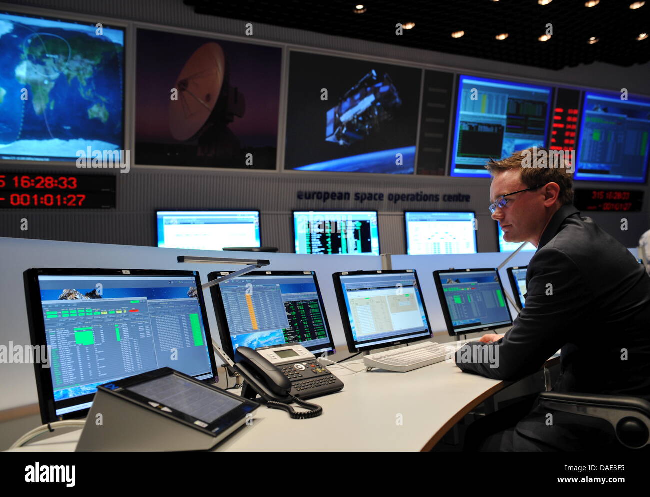 Space controller Michael Morgan sits at his monitors in the newly ...