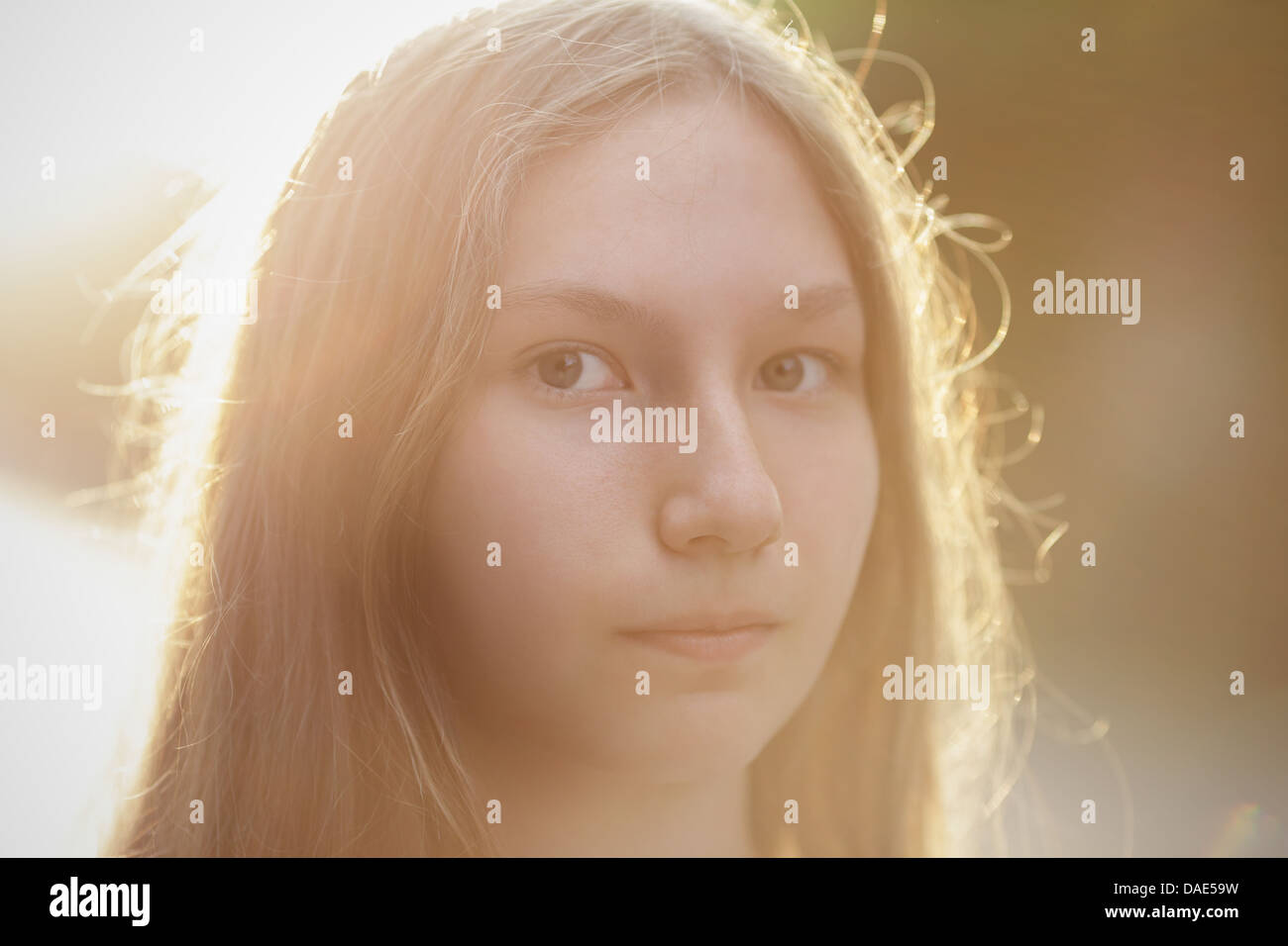 close up portrait of attractive teen girl in sunset, backlighted Stock ...