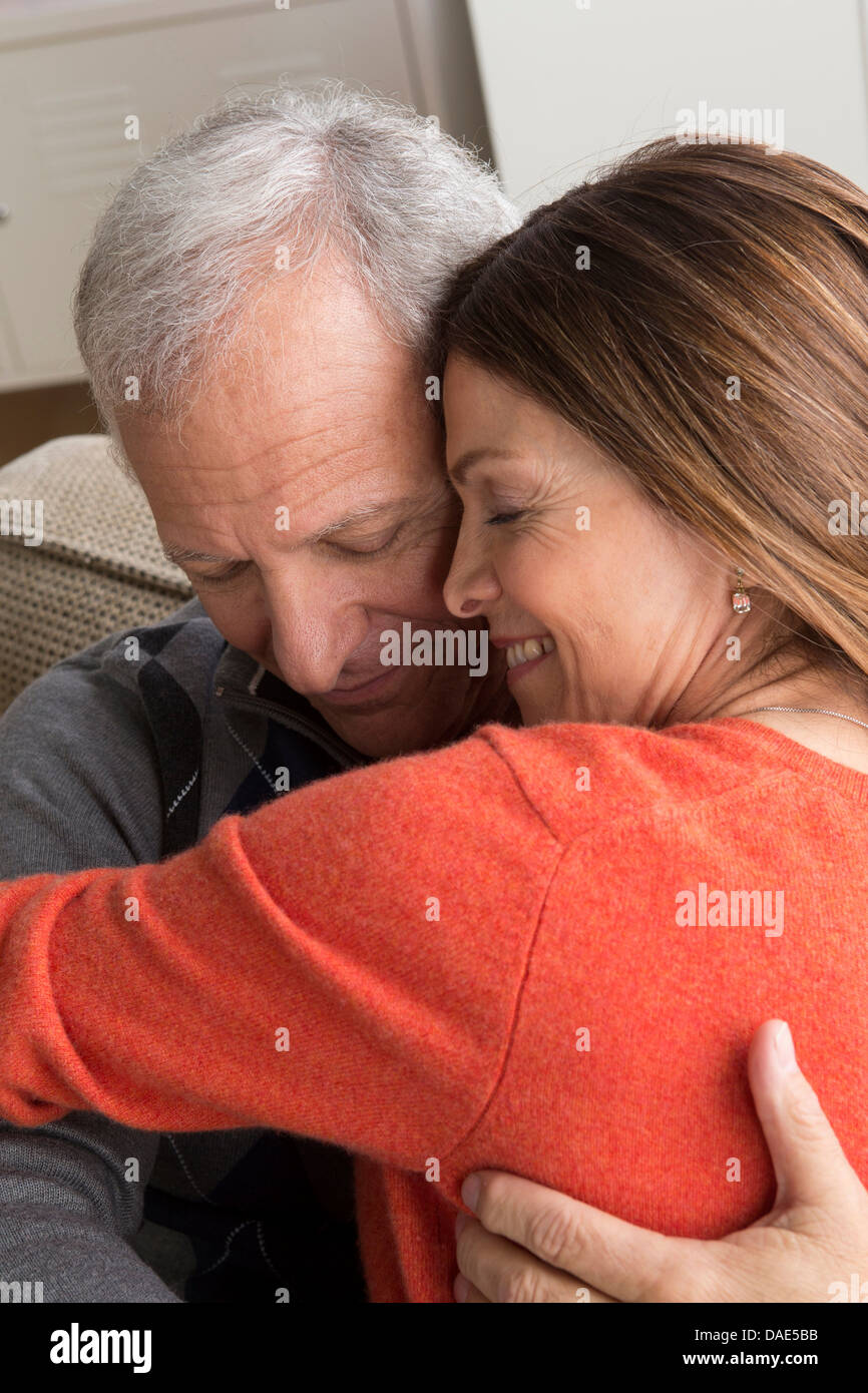 Mature woman senior man hugging hi-res stock photography and images - Alamy