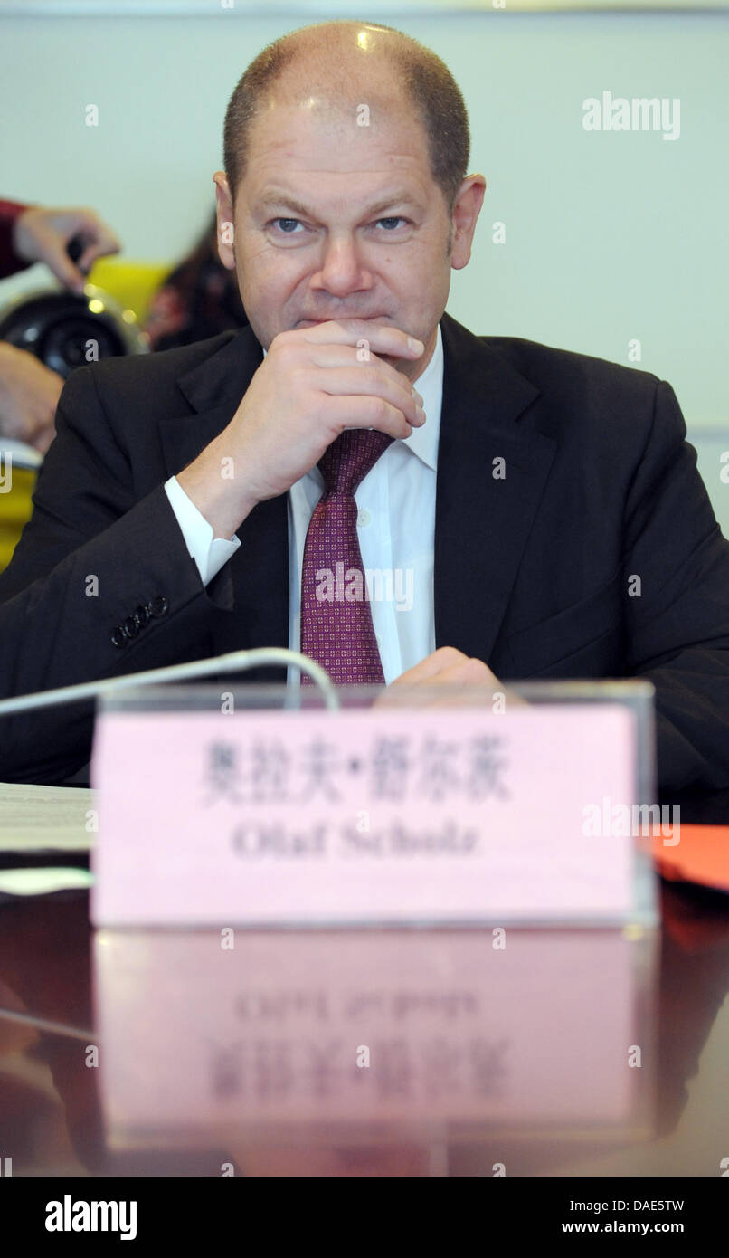 Hamburg's first mayor Olaf Scholz sits inside the China-EU School of ...